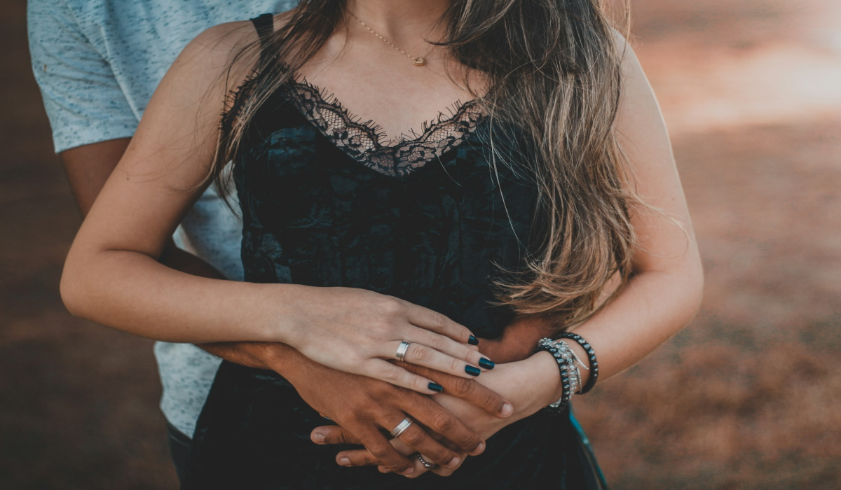 Intertwined Hands in Embrace: The Symbol of Intimacy | JigPlay.com